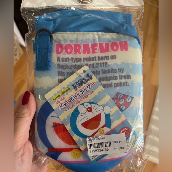 Sanrio | Accessories | Doraemon Water Bottle Sleeve With Strap | Poshmark